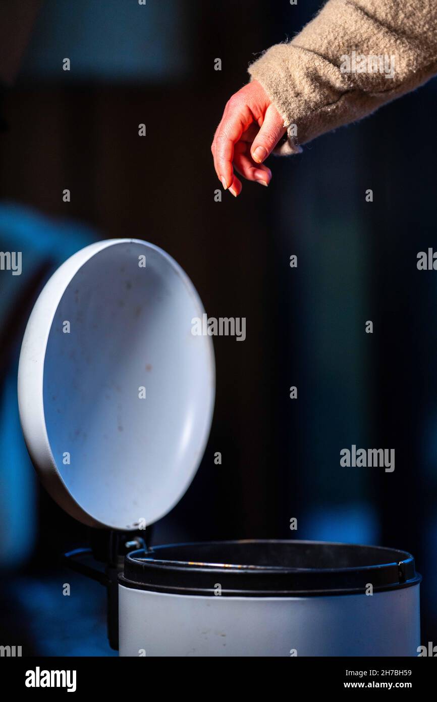 mask in bin, rubbish, garbage and trash. Littering a safety mask in ...