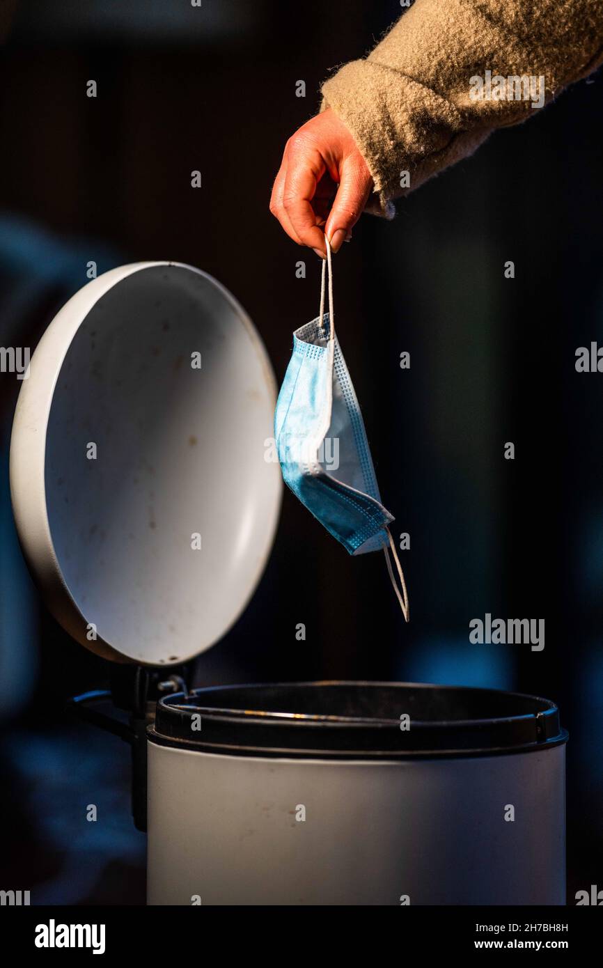 mask in bin, rubbish, garbage and trash. Littering a safety mask in ...
