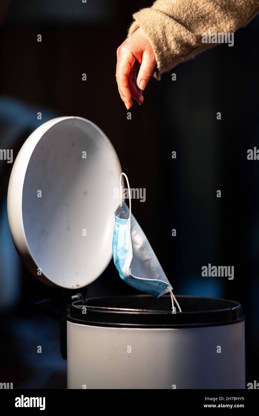 mask in bin, rubbish, garbage and trash. Littering a safety mask in ...