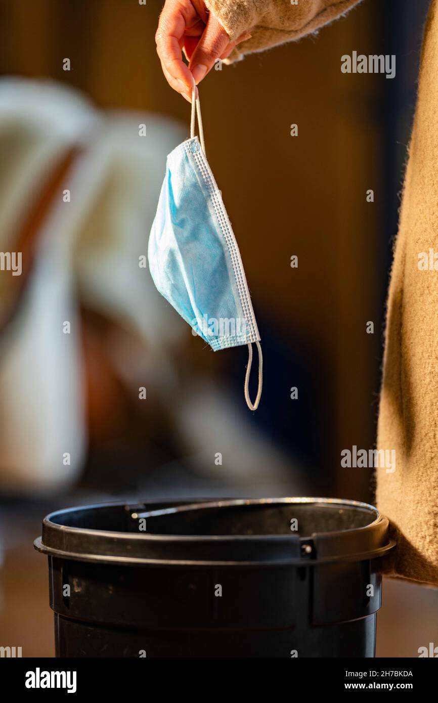 mask in bin, rubbish, garbage and trash. Littering a safety mask in ...