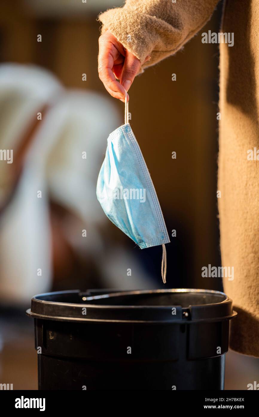 mask in bin, rubbish, garbage and trash. Littering a safety mask in ...