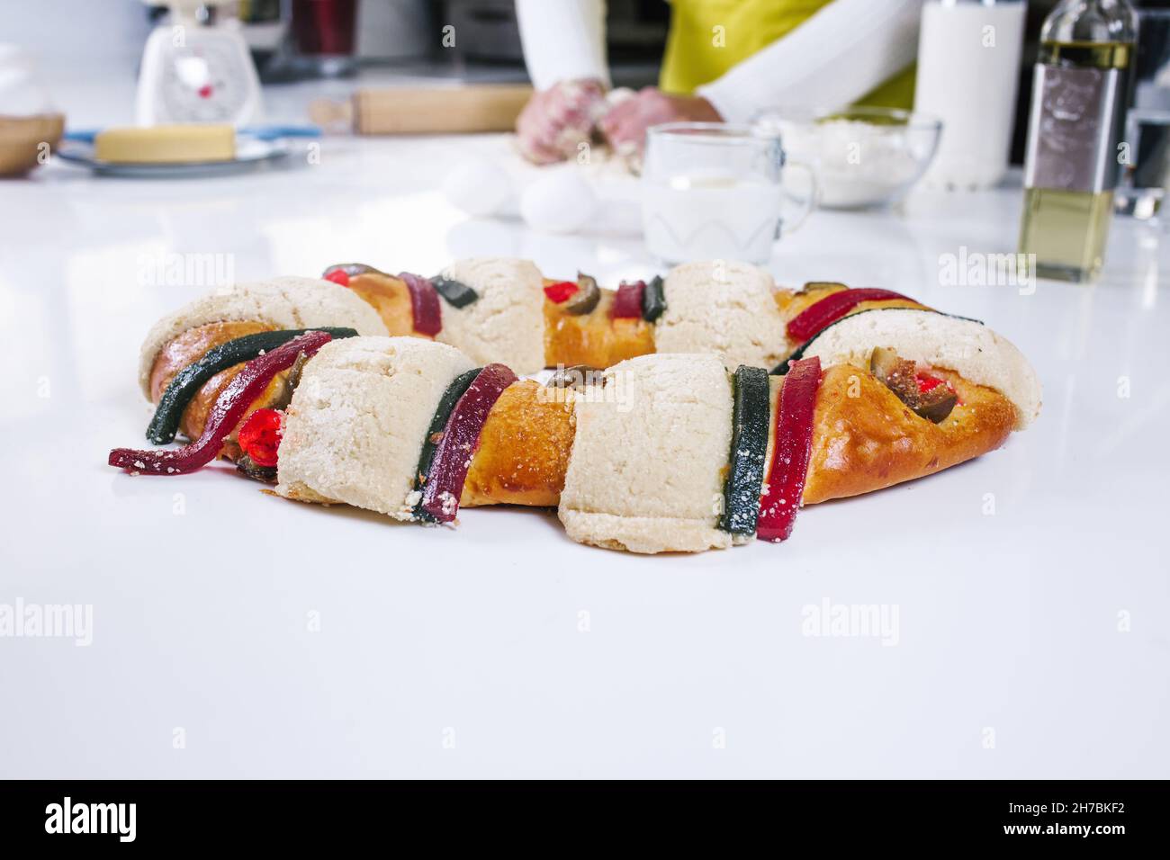 mexican woman baking a traditional rosca de reyes or epiphany cake on ...