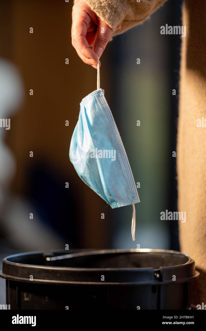 mask in bin, rubbish, garbage and trash. Littering a safety mask in ...