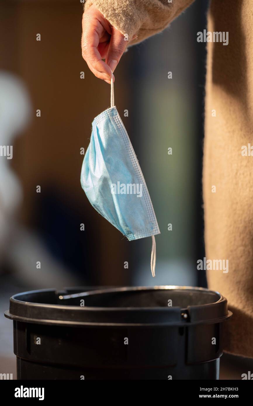 mask in bin, rubbish, garbage and trash. Littering a safety mask in ...