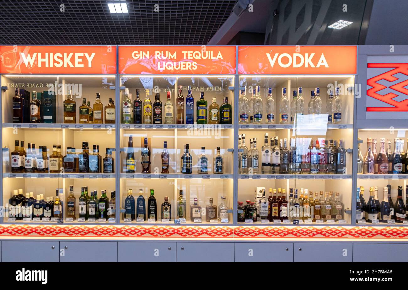 Displays with duty-free alcohol drinks liquors in Minsk National ...