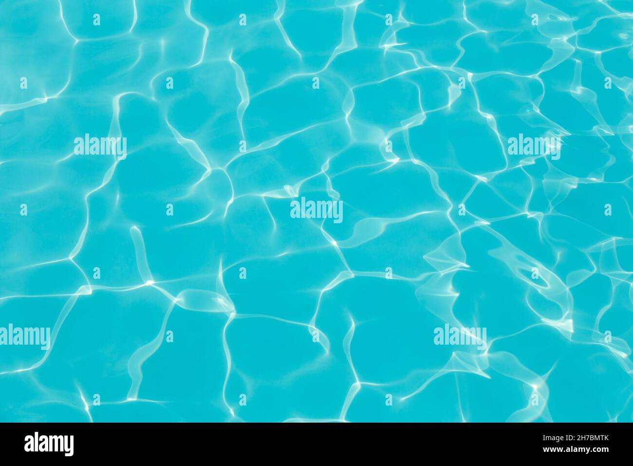Swimming Pool Surface reflection background Stock Photo - Alamy
