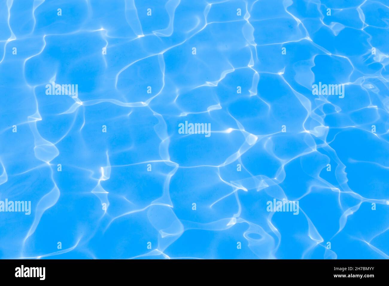 Swimming Pool Surface reflection background Stock Photo - Alamy