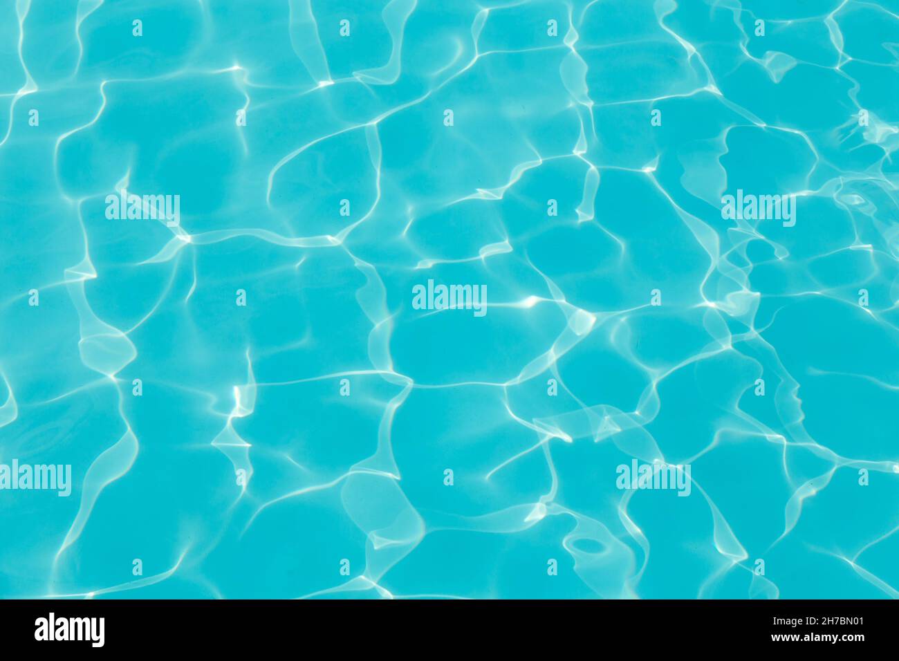 Swimming Pool Surface reflection background Stock Photo - Alamy