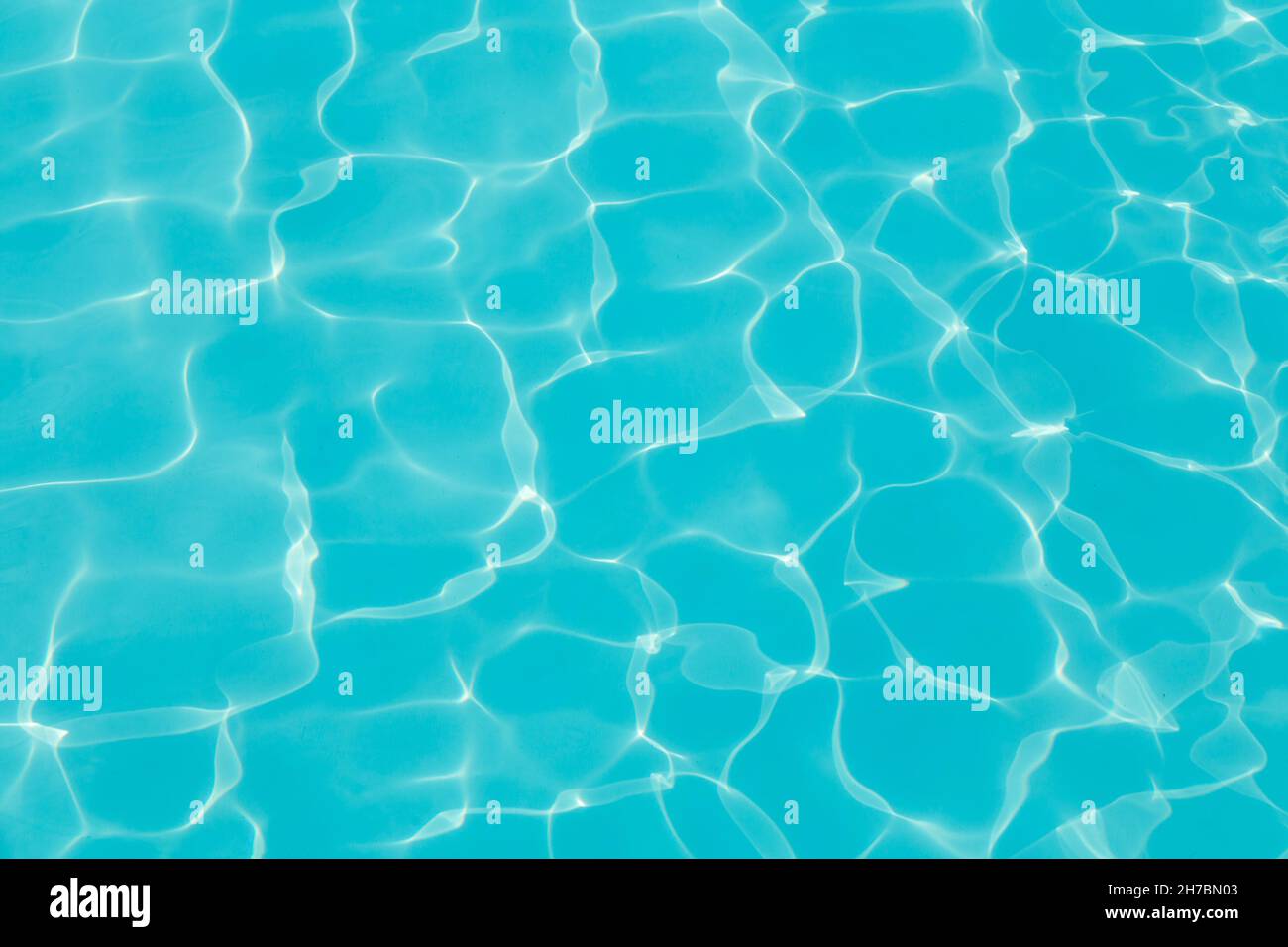 Swimming Pool Surface reflection background Stock Photo - Alamy