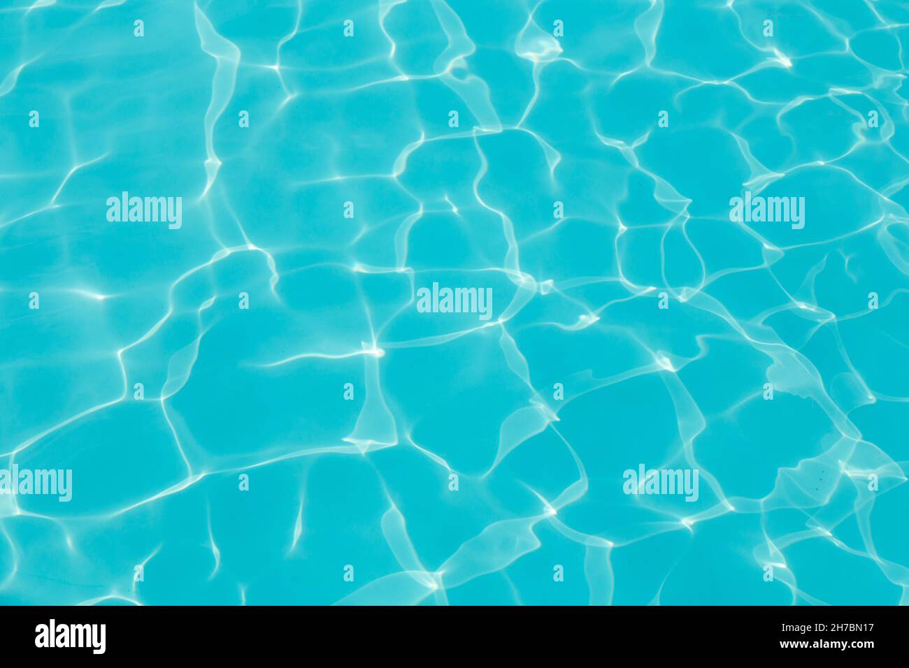 Swimming Pool Surface reflection background Stock Photo - Alamy