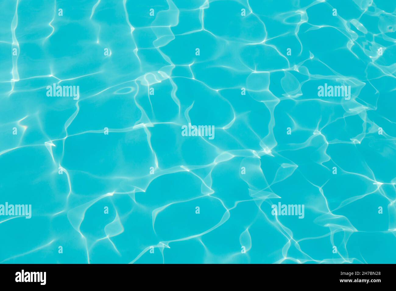 Swimming Pool Surface reflection background Stock Photo - Alamy