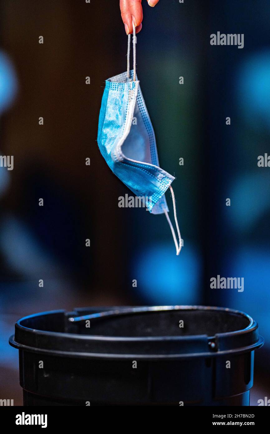 mask in bin, rubbish, garbage and trash. Littering a safety mask in ...