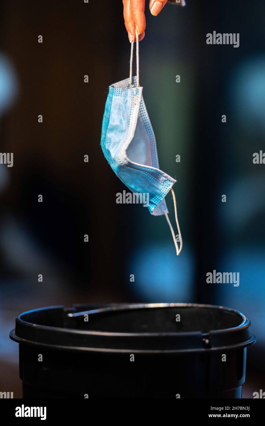 mask in bin, rubbish, garbage and trash. Littering a safety mask in ...