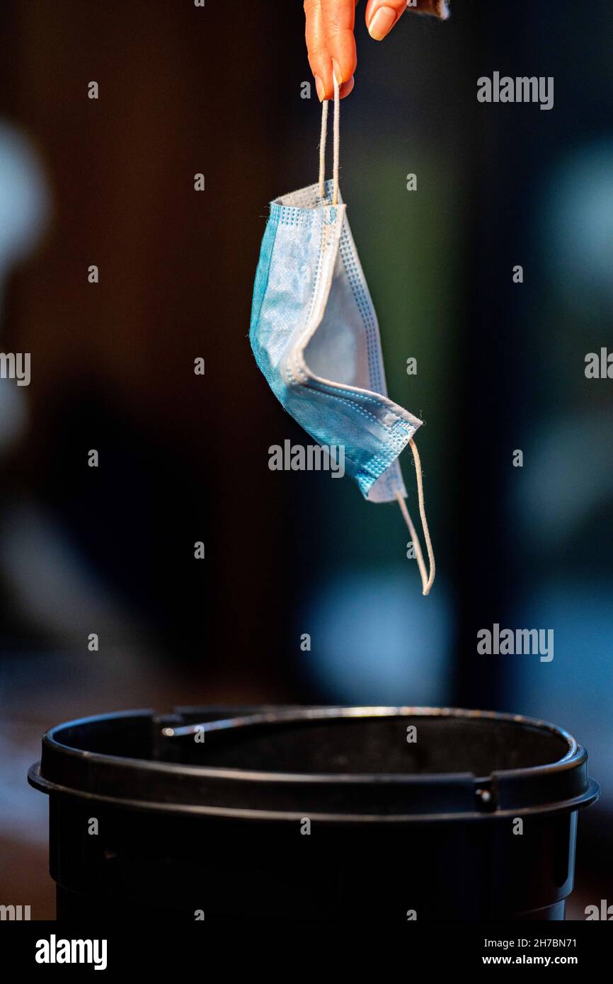 mask in bin, rubbish, garbage and trash. Littering a safety mask in ...