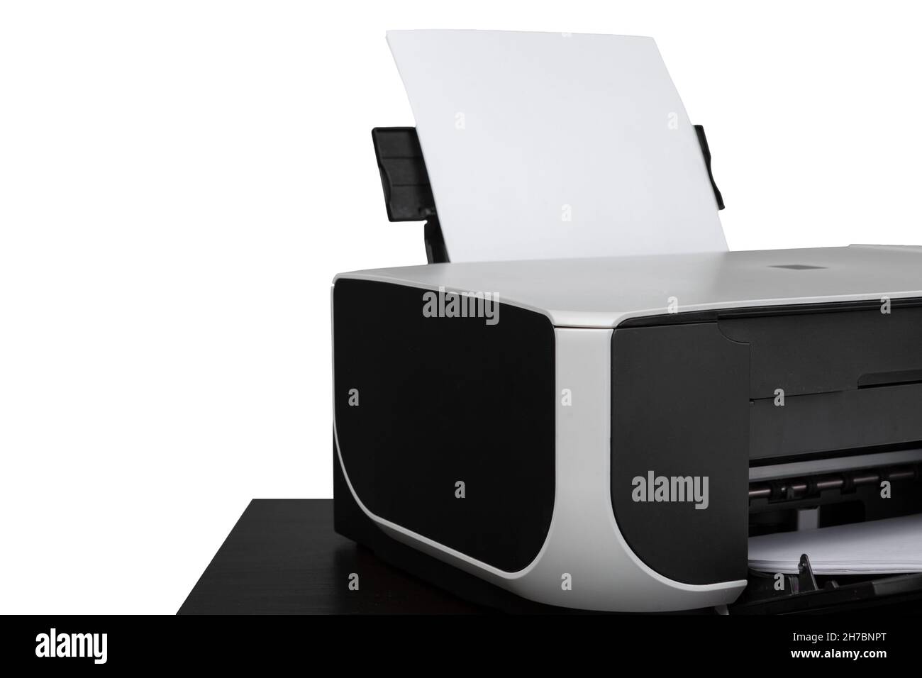 Laser home printer on table against white backgorund Stock Photo - Alamy