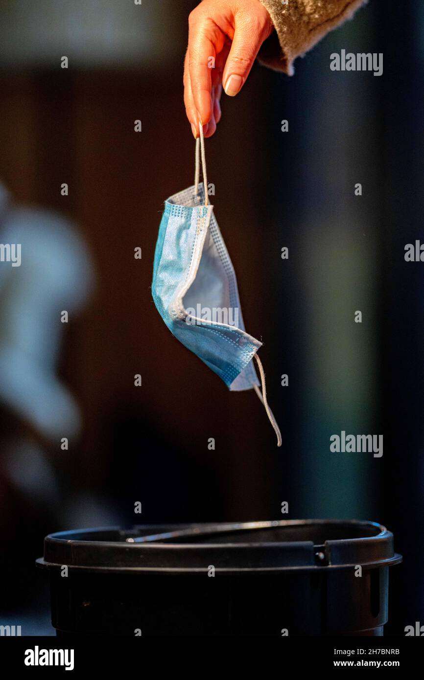 mask in bin, rubbish, garbage and trash. Littering a safety mask in ...