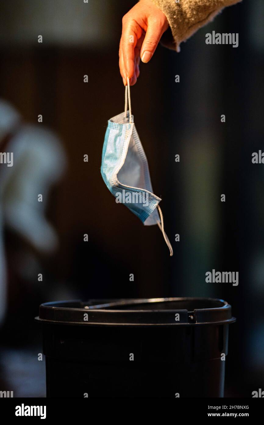 mask in bin, rubbish, garbage and trash. Littering a safety mask in ...