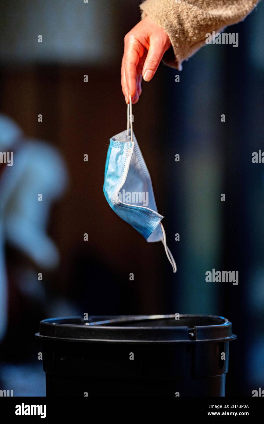 mask in bin, rubbish, garbage and trash. Littering a safety mask in ...