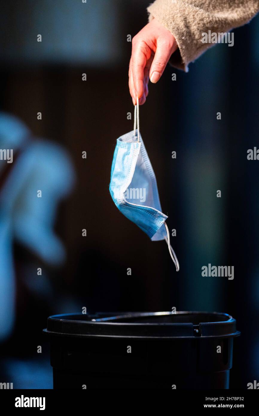 mask in bin, rubbish, garbage and trash. Littering a safety mask in ...