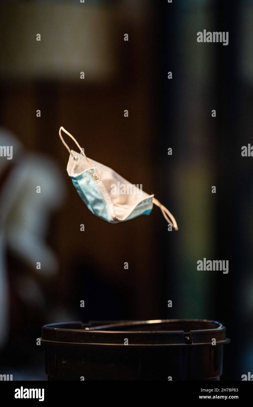 mask in bin, rubbish, garbage and trash. Littering a safety mask in ...