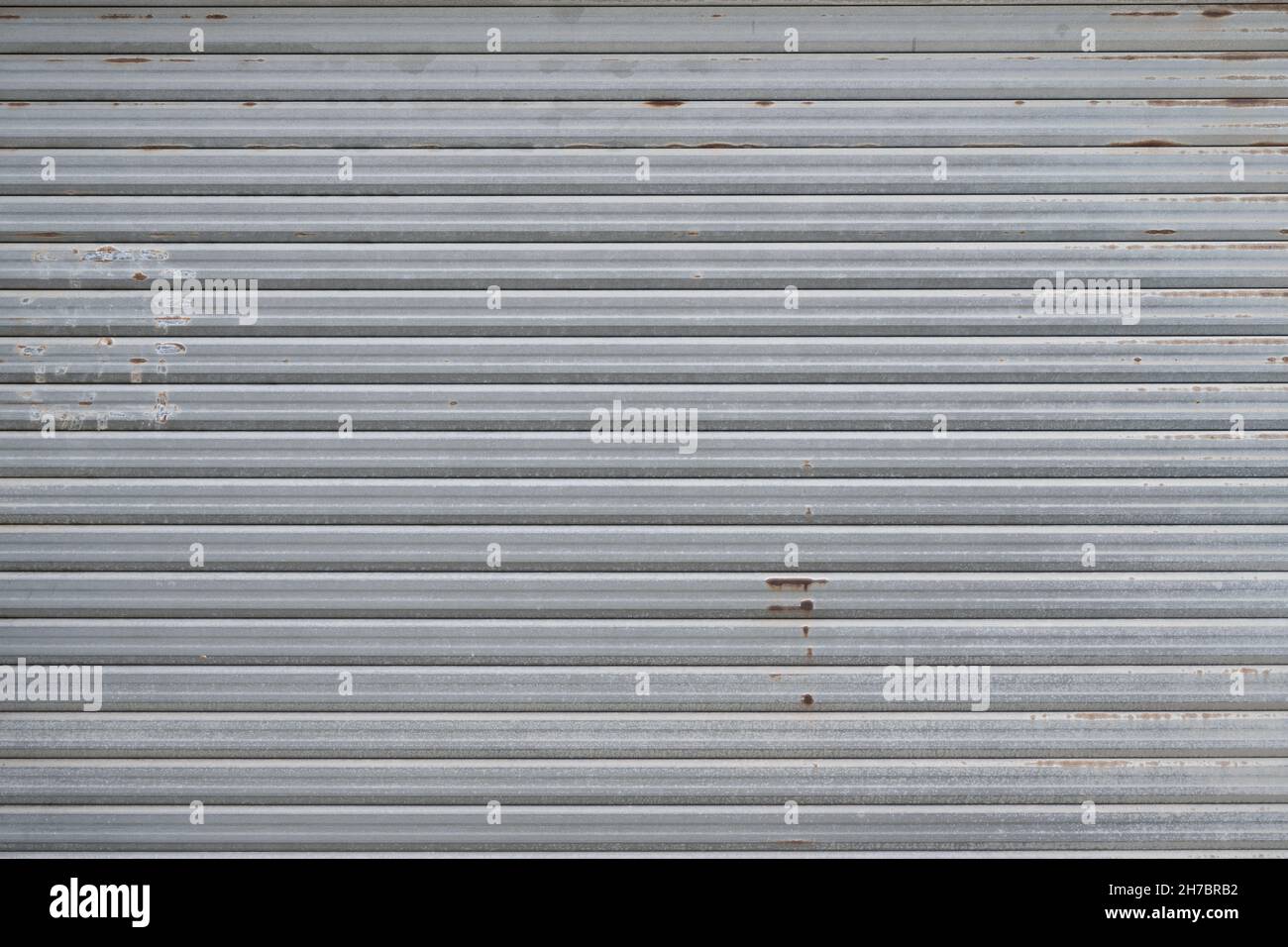 gray metal garage door with light rust damage. Texture, Background ...