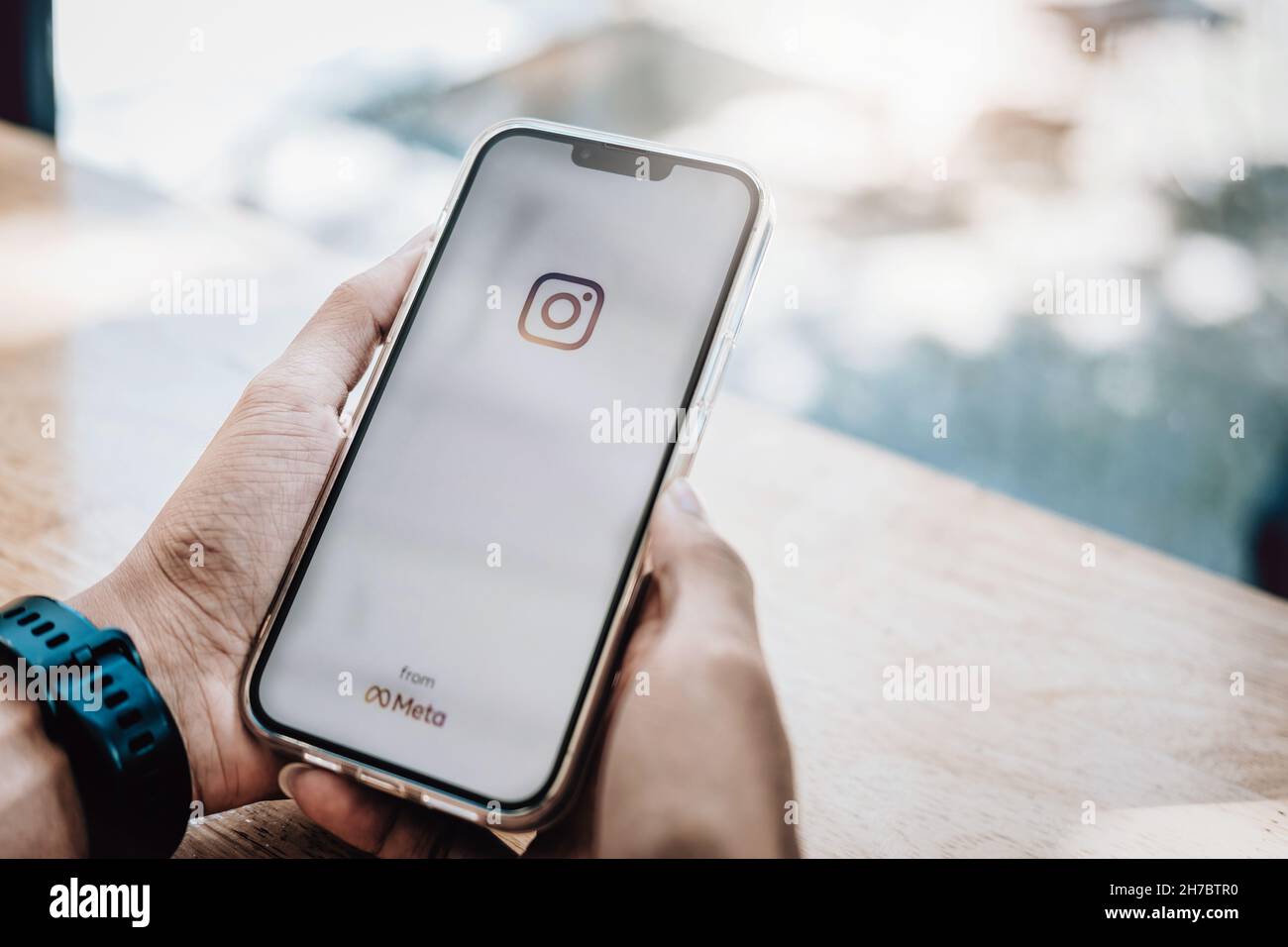 CHIANGMAI, THAILAND - Nov 07, 2021: A man holding smartphone with ...