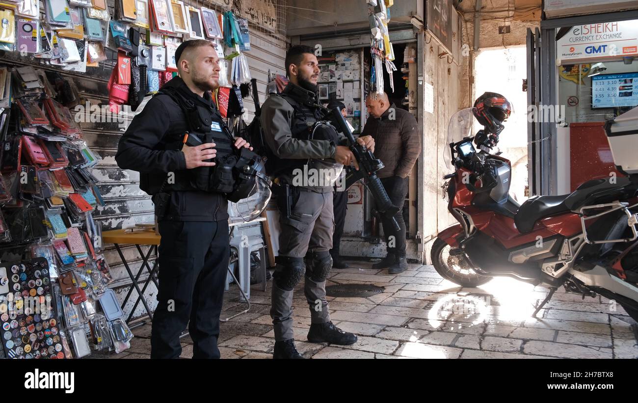 Members of the Israeli Security Forces stand guard at Damascus Gate in ...