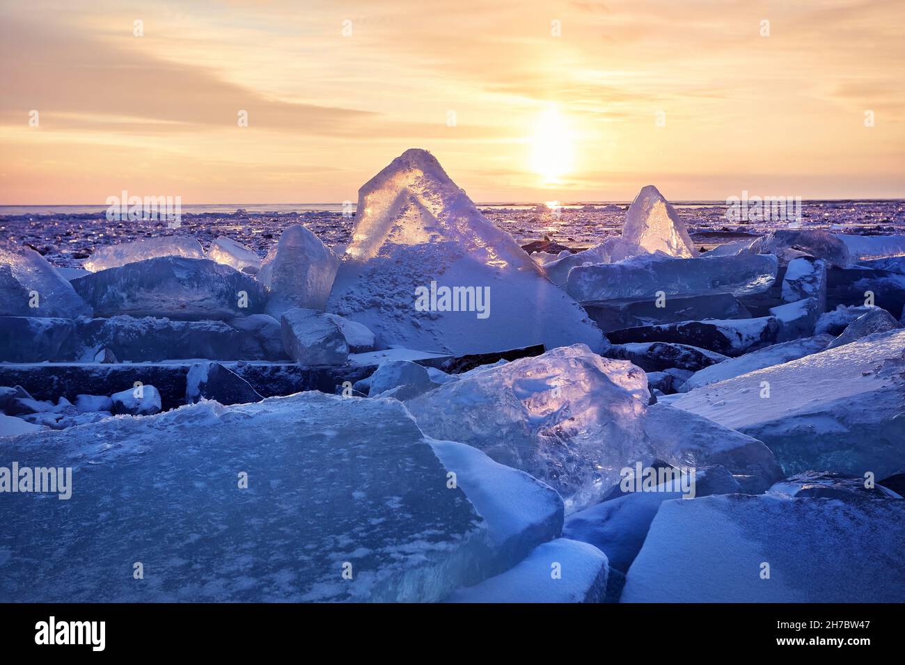 Beautiful landscape of triangle Ice hummock and cracks at frozen lake ...