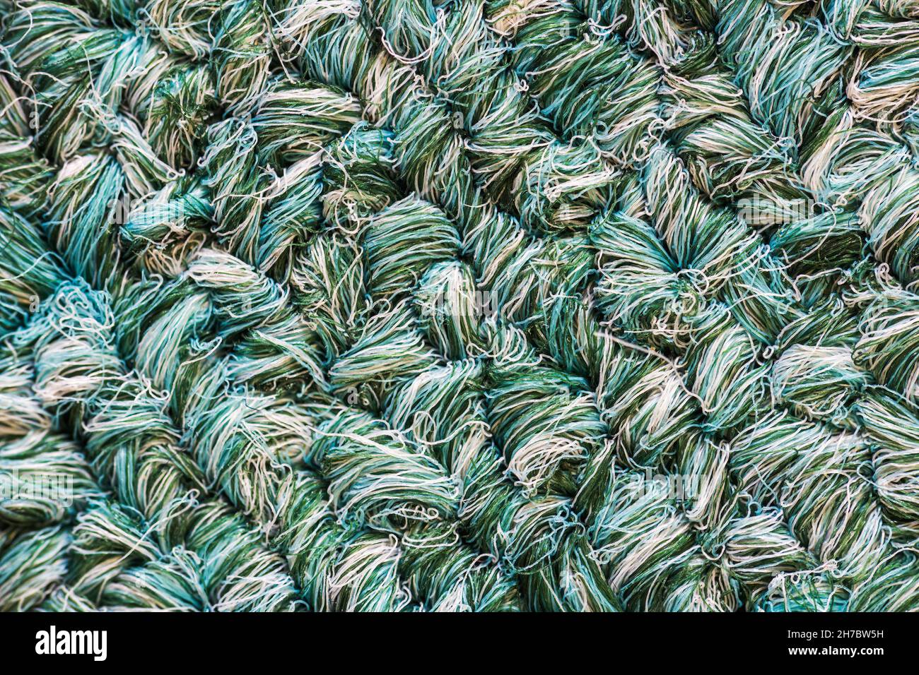Macro photo of contract carpet texture background. Green and white rug ...