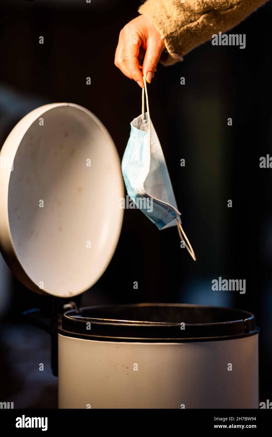 mask in bin, rubbish, garbage and trash. Littering a safety mask in ...