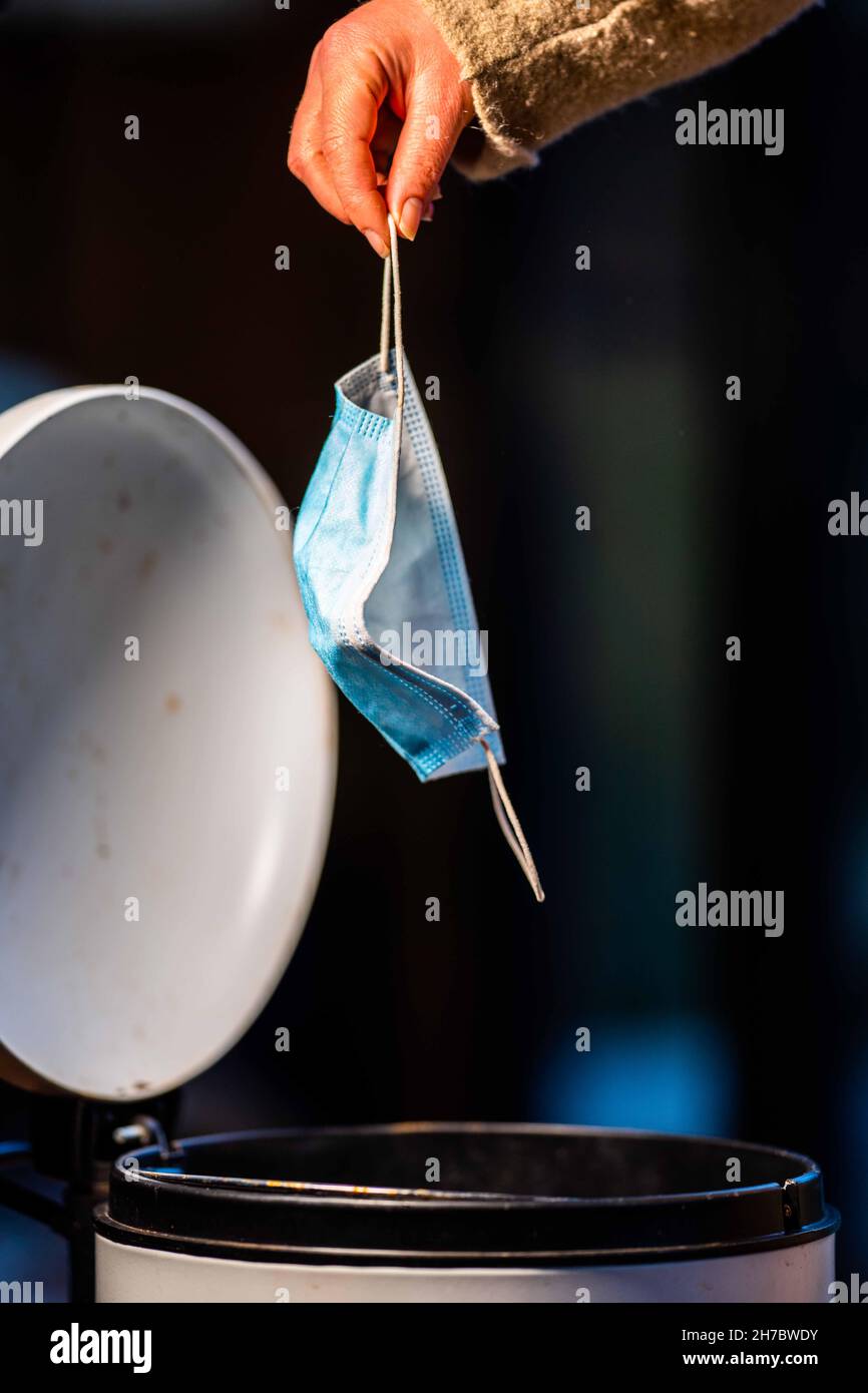 mask in bin, rubbish, garbage and trash. Littering a safety mask in ...