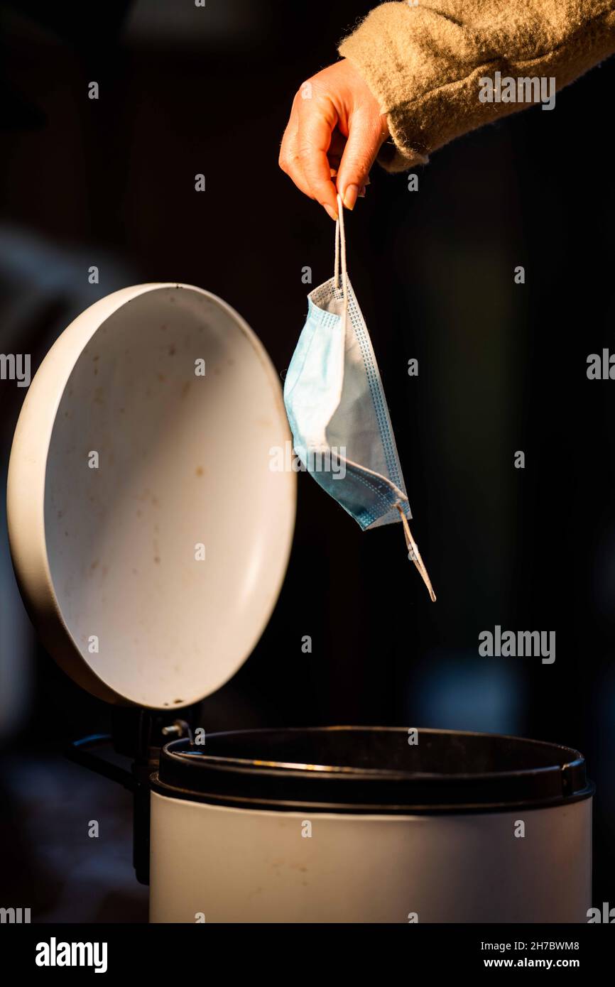 mask in bin, rubbish, garbage and trash. Littering a safety mask in ...