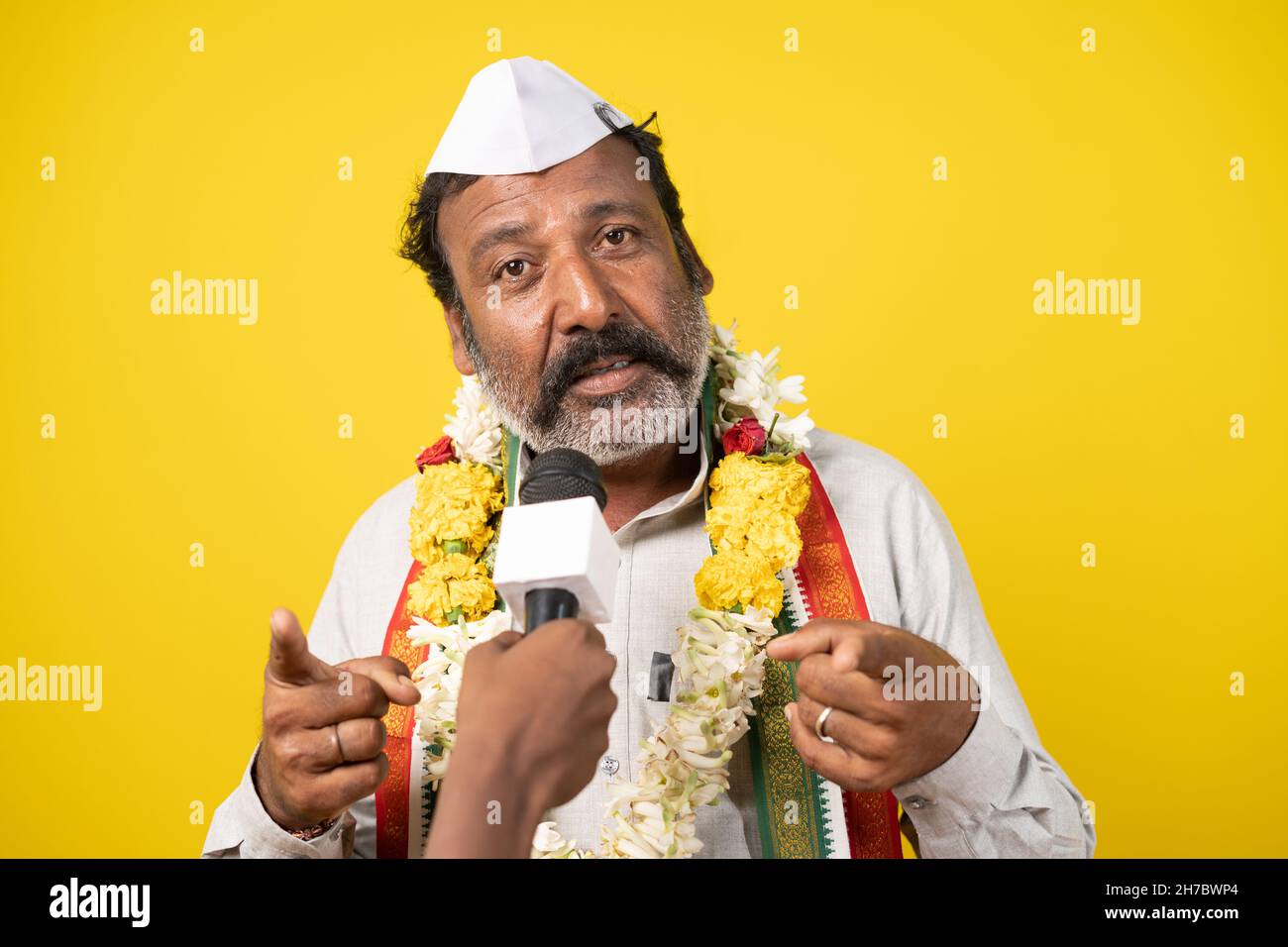 Political person answering to media reporter questions by looking ...