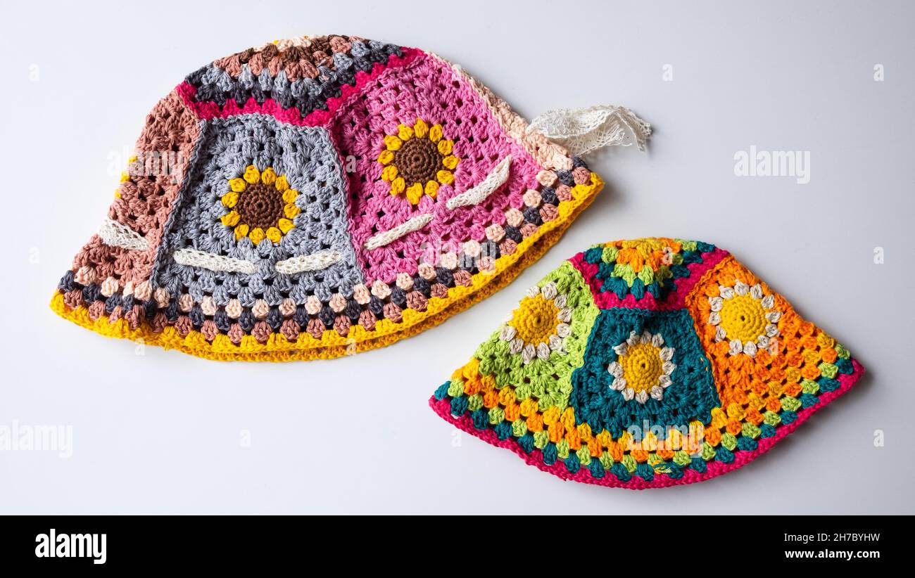 Top view handmade product to make spring present, colorful bucket hat ...