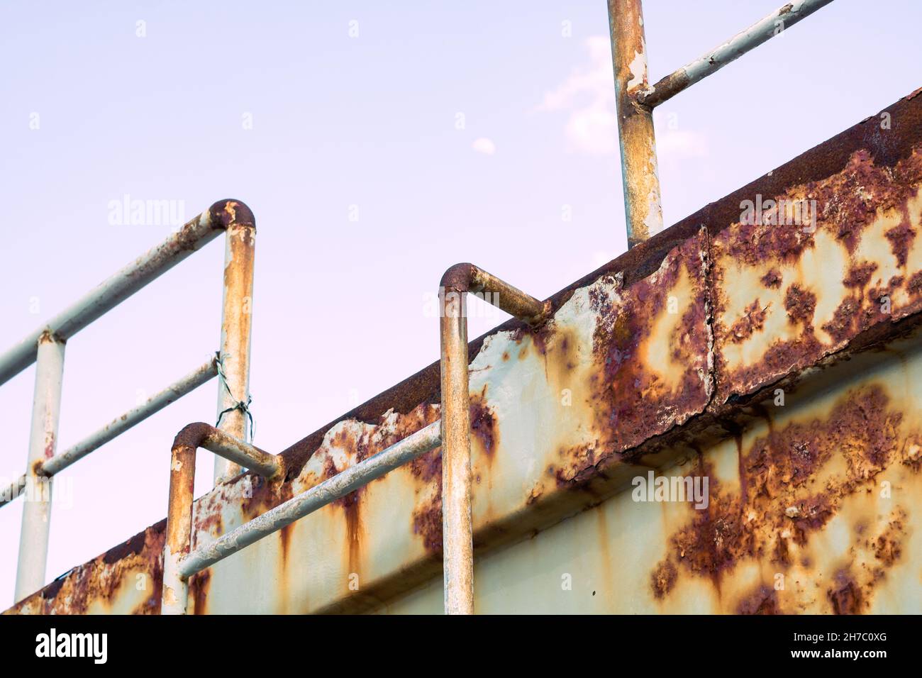 Rusty ship. Rusty boat with ladder and handrails. Vintage boat. Ship ...