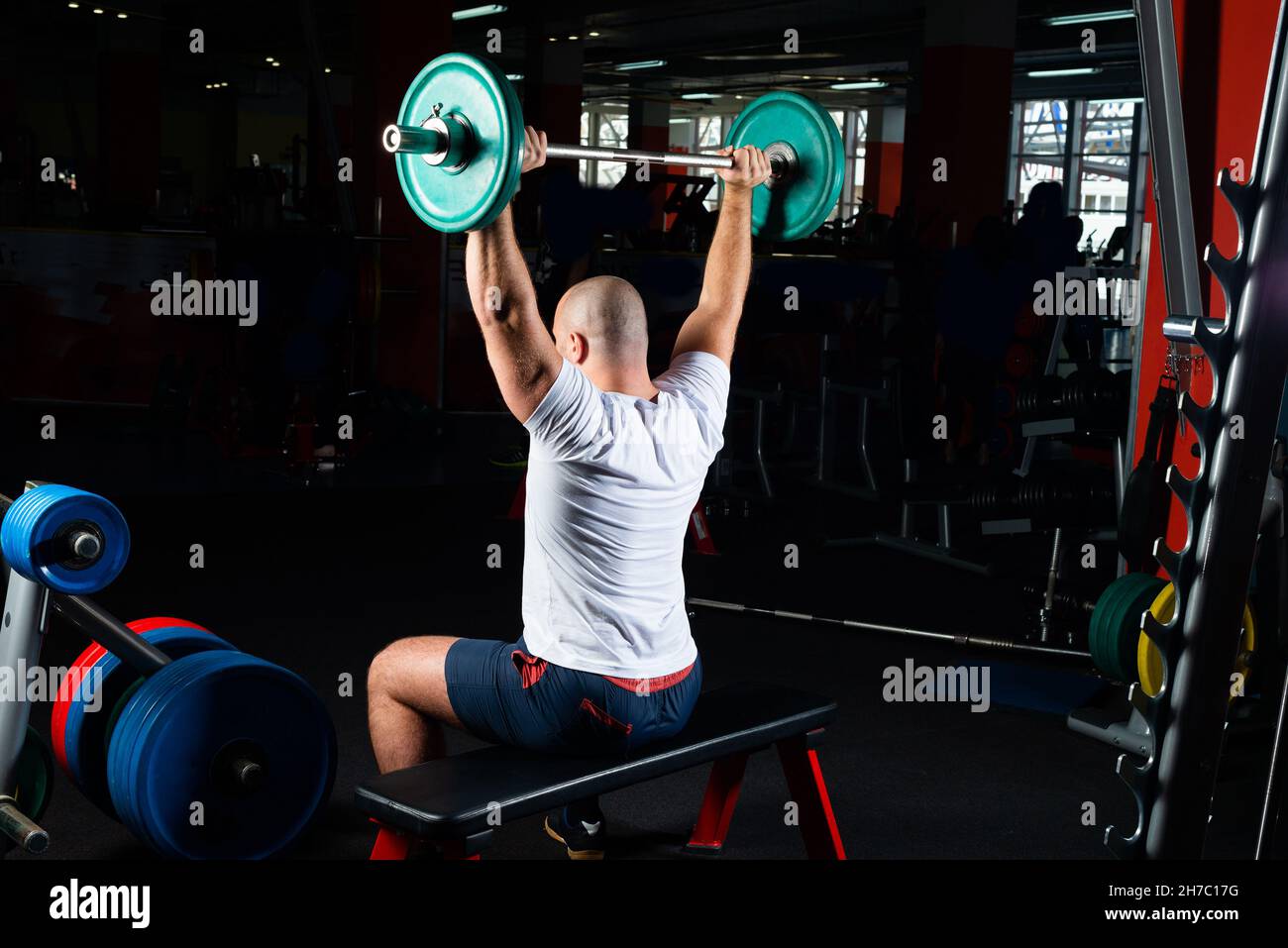 Young athlete lifts heavy barbell hi-res stock photography and images ...