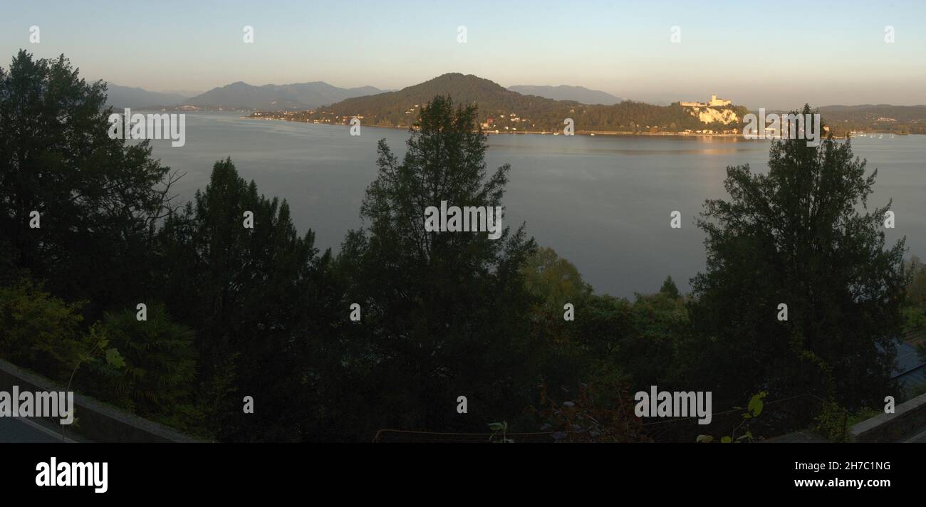 View across Lago Maggiore from Arona showing the Rocca di Angera castle ...