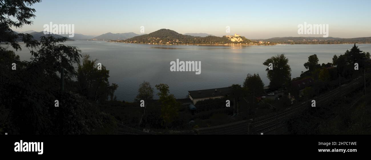 View across Lago Maggiore from Arona showing the Rocca di Angera castle ...