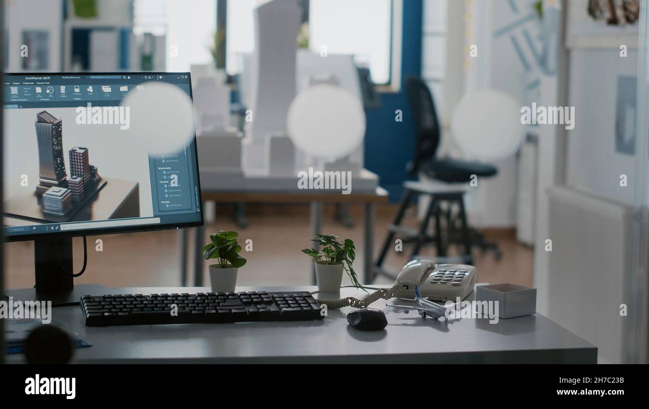 Empty architectural workplace with building model and 3d construction ...