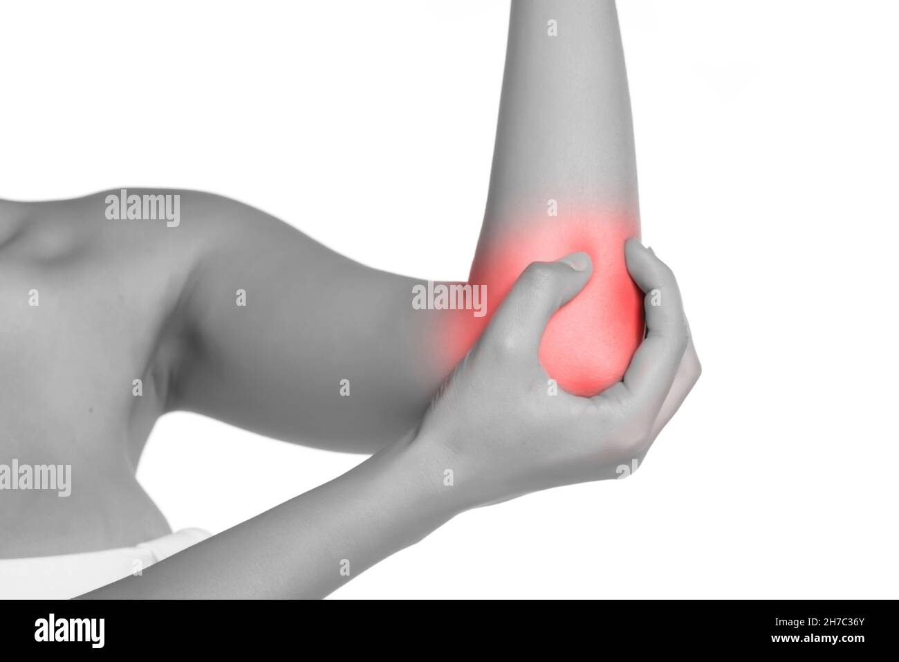 female massaging her aching elbow on a white background Stock Photo - Alamy