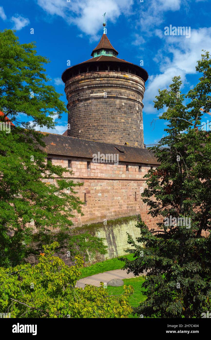 Old medieval tower in the historical part of the city on a sunny day ...