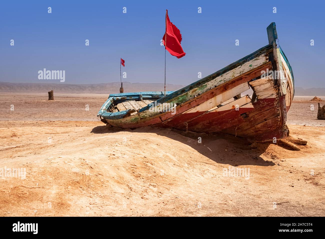 Sahara Desert, Tunisia. An old boat stands alone in the middle of a ...