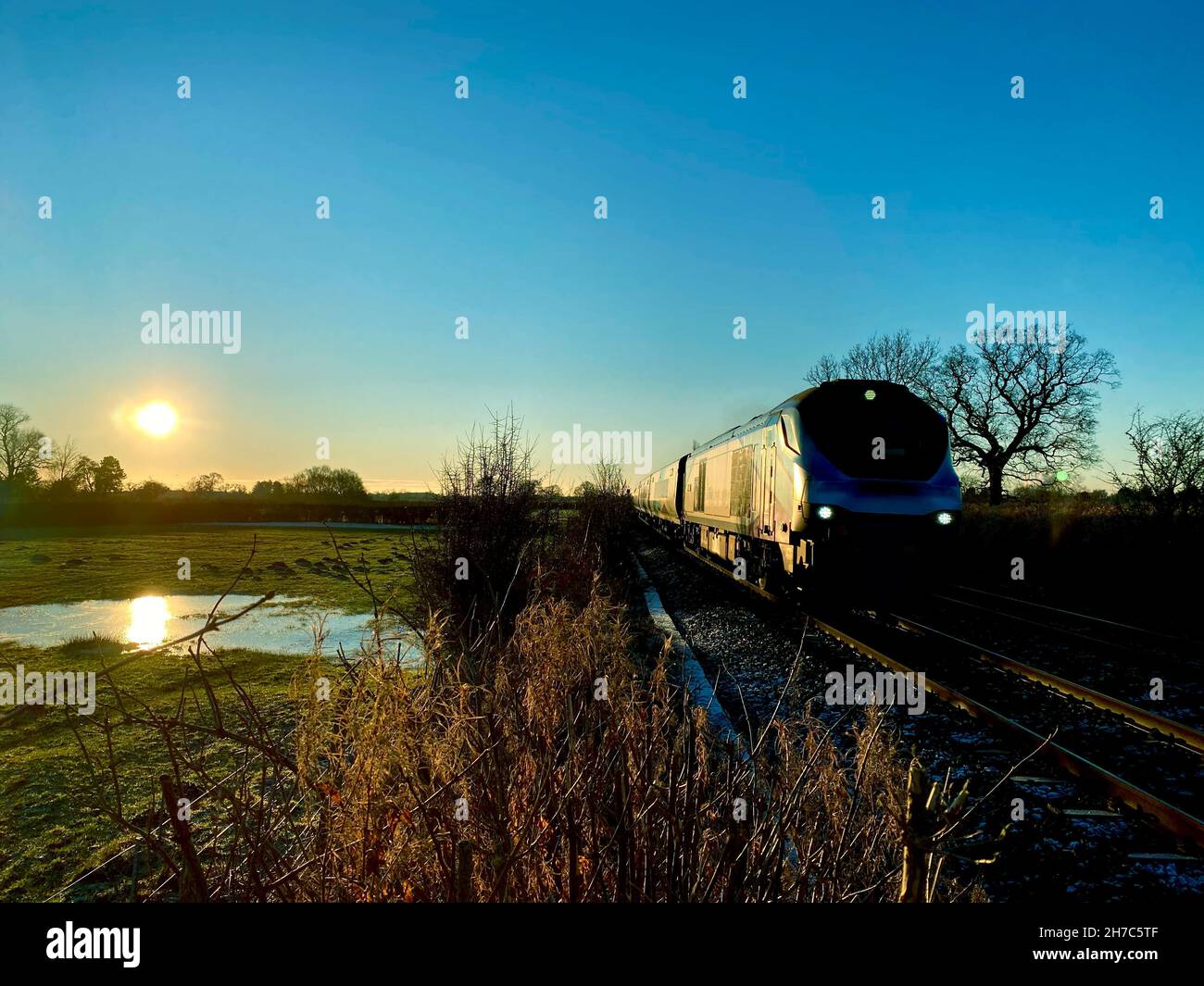 Road train and sunset hi-res stock photography and images - Alamy