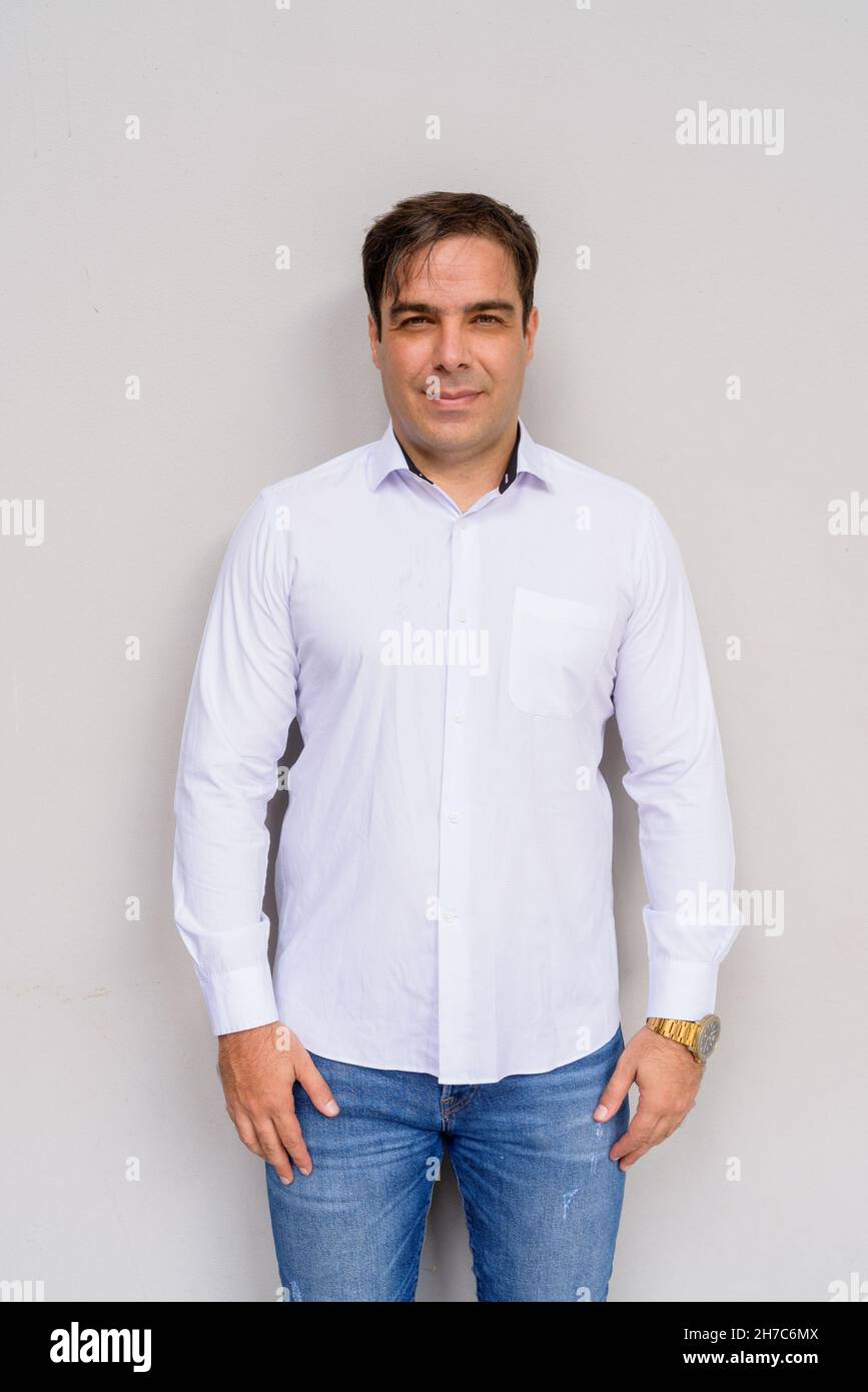 Portrait of handsome Persian man against plain background Stock Photo ...