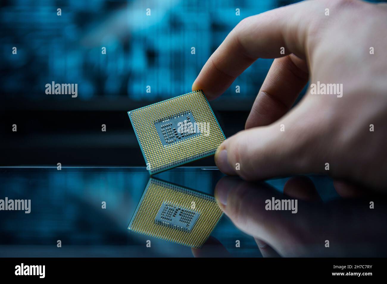 Computer chip in hands. A chipset is a set of electronic component that ...