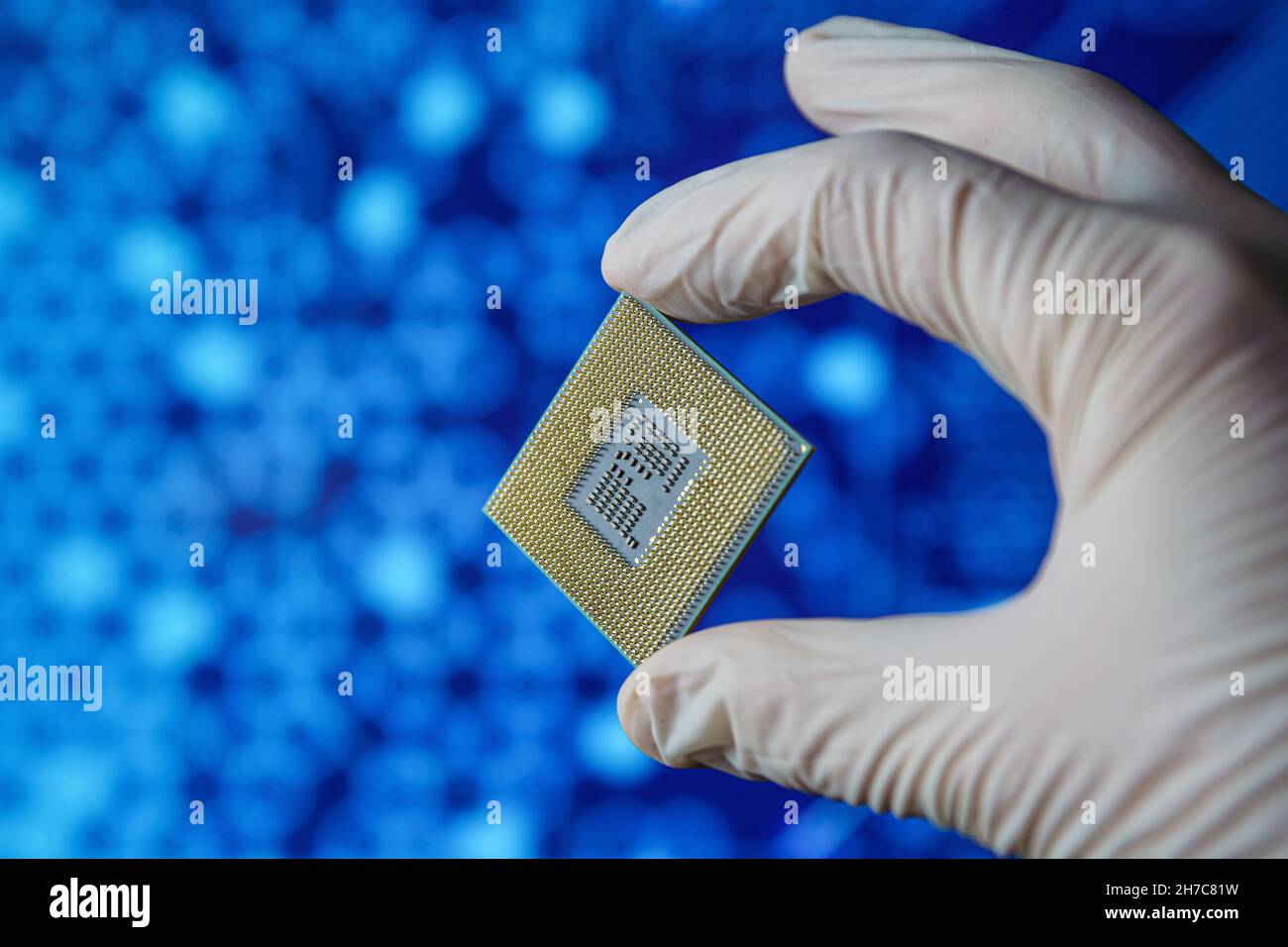 Computer chip in hands. A chipset is a set of electronic component that ...