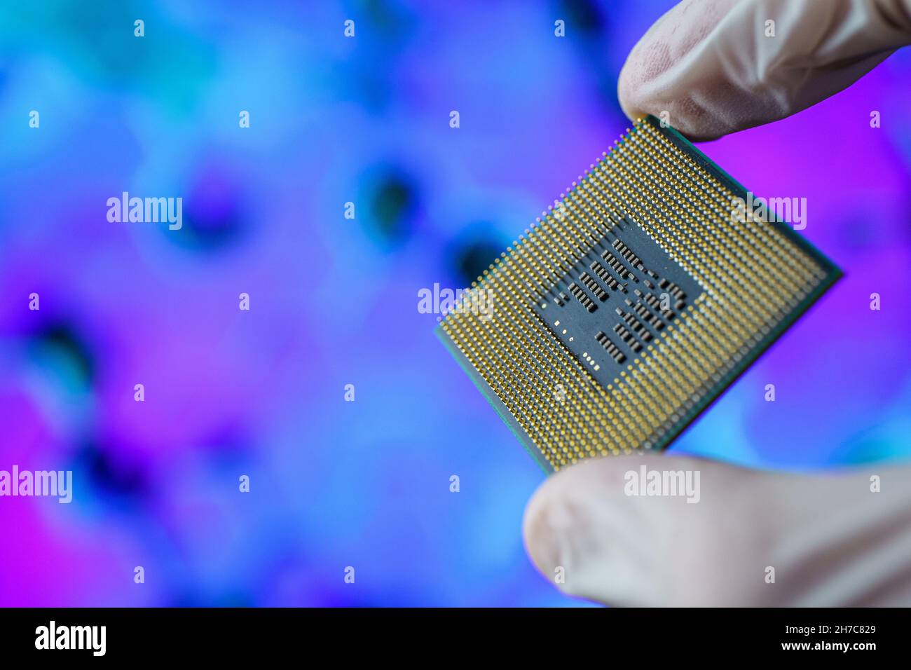 Computer chip in hands. A chipset is a set of electronic component that ...