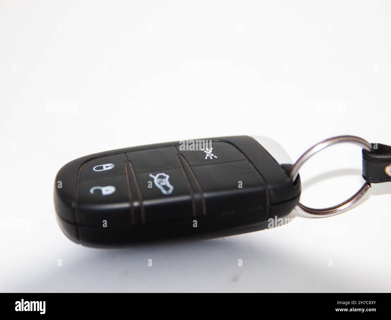 Black car keys isolated on white background Stock Photo - Alamy