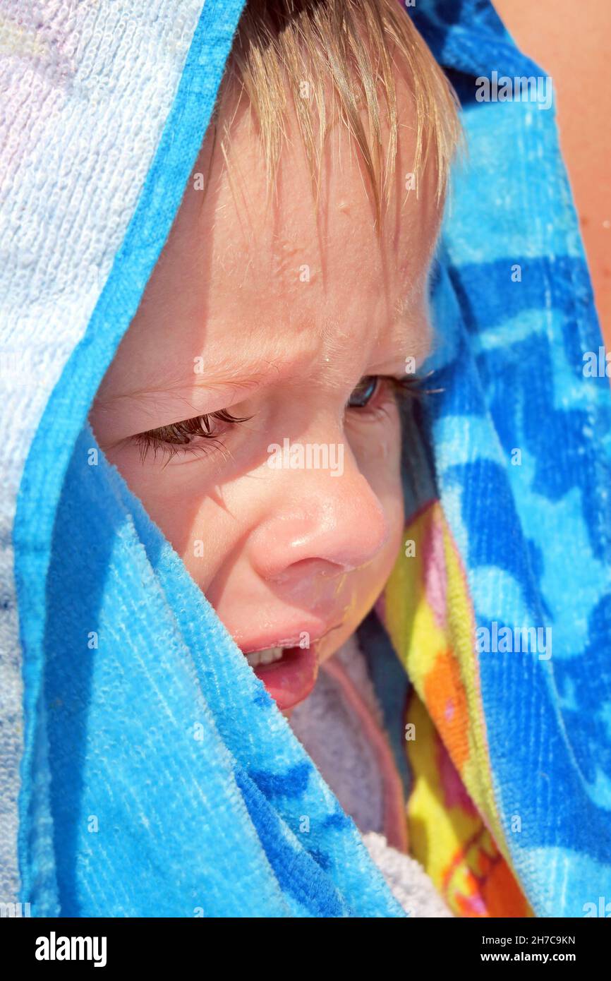 Infant crying beach hi-res stock photography and images - Alamy