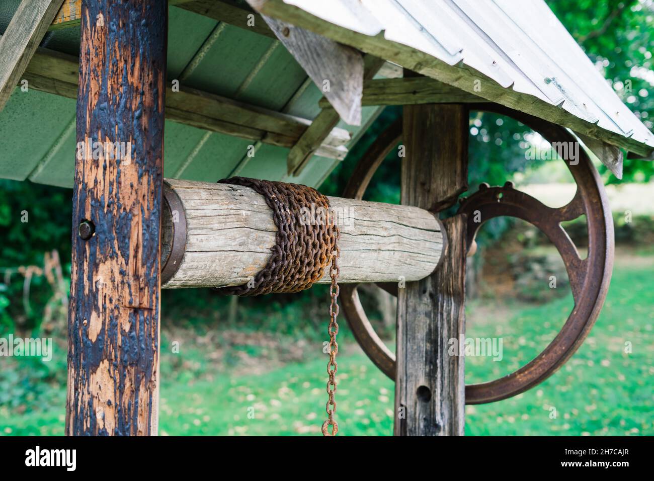 Old water well in a village, abandoned place Stock Photo - Alamy